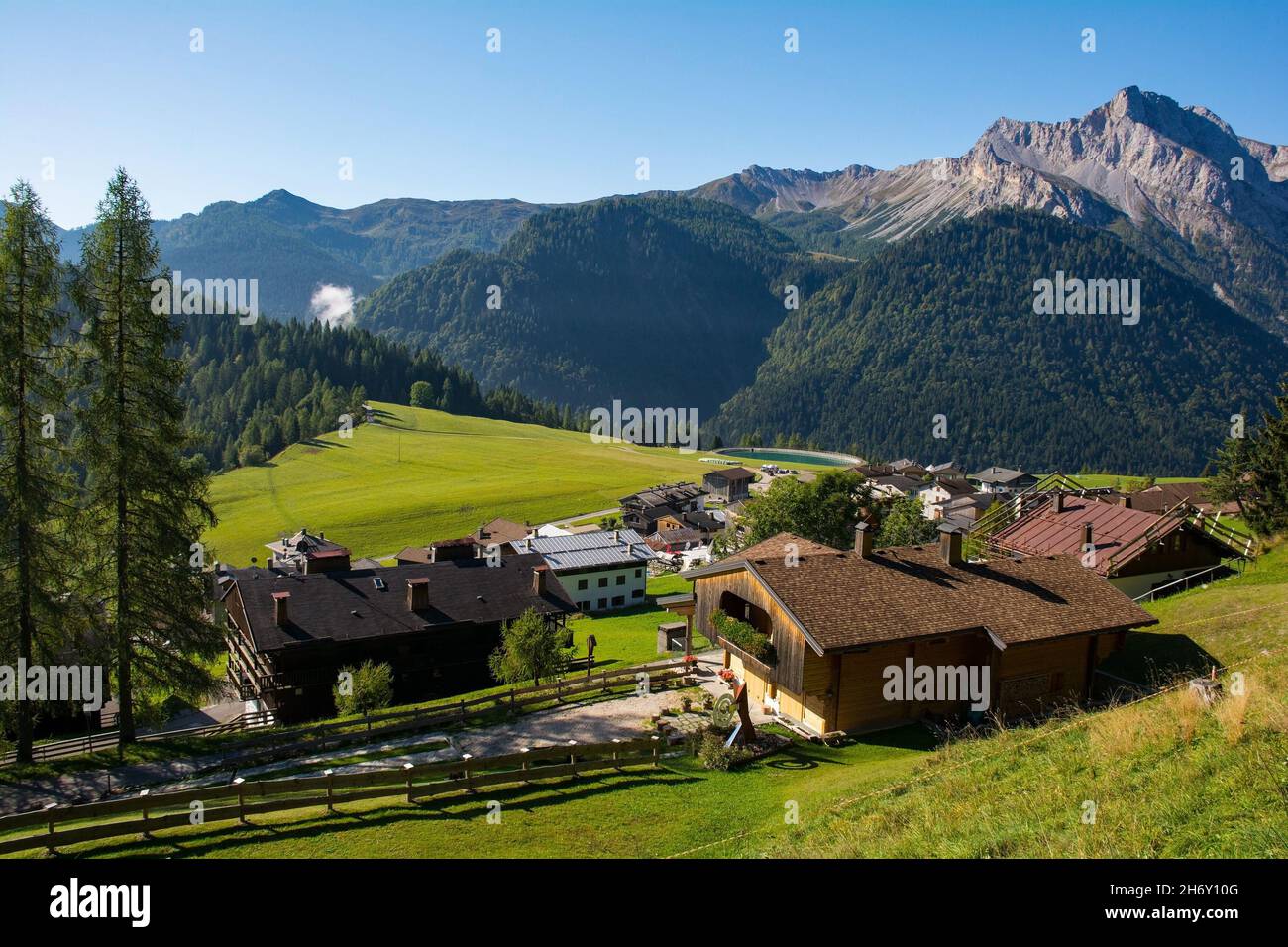 Traditional wooden buildings in the Alpine village of Sauris di Sopra ...