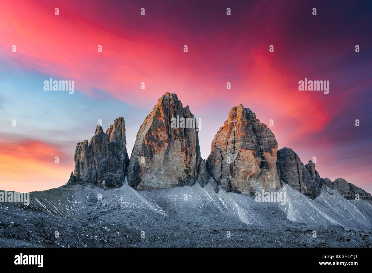 Incredible view of the Three Peaks of Lavaredo on sunset time. National Park Tre Cime di ...