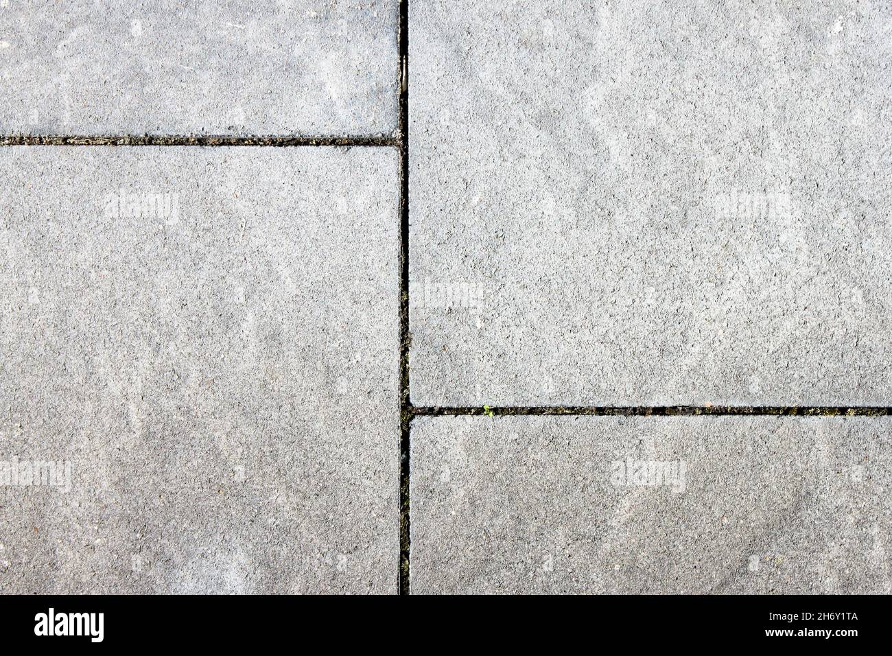 Rectangular gray stone slabs with joints Stock Photo - Alamy