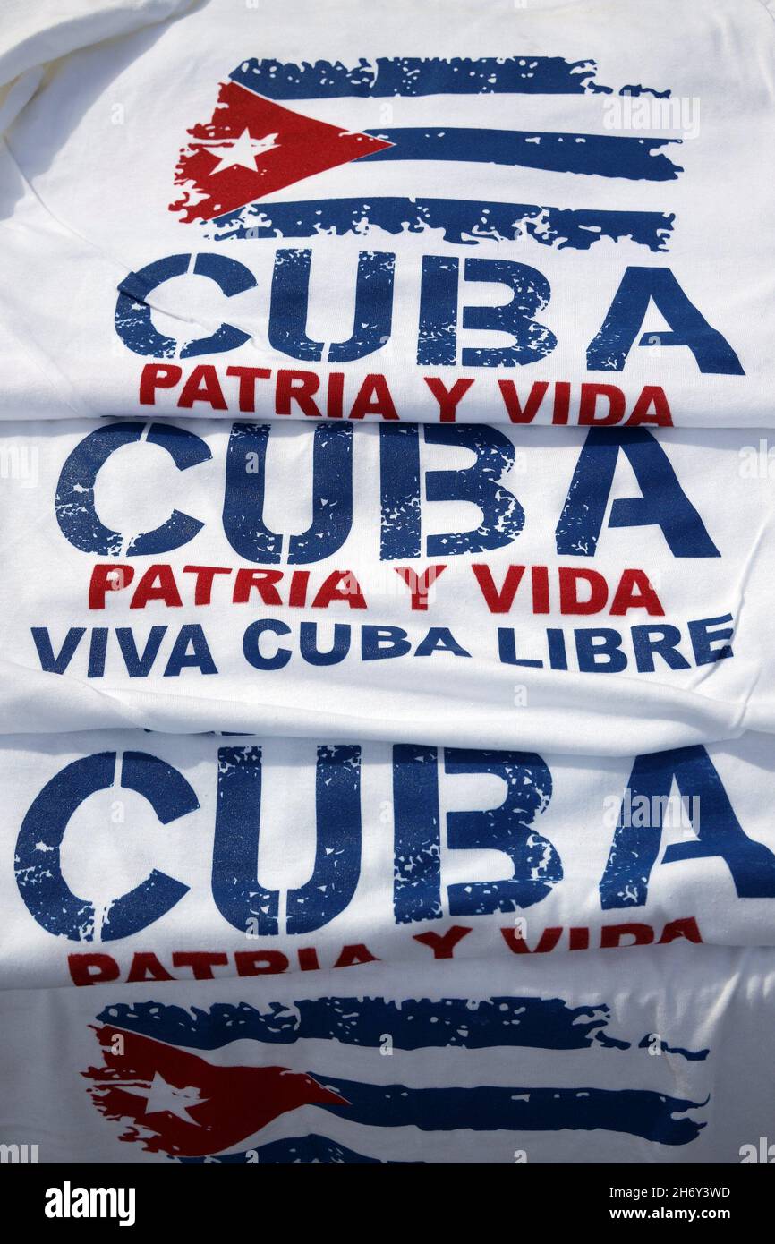 Shirts are displayed for purchase at the Cuban Resistance rally near ...