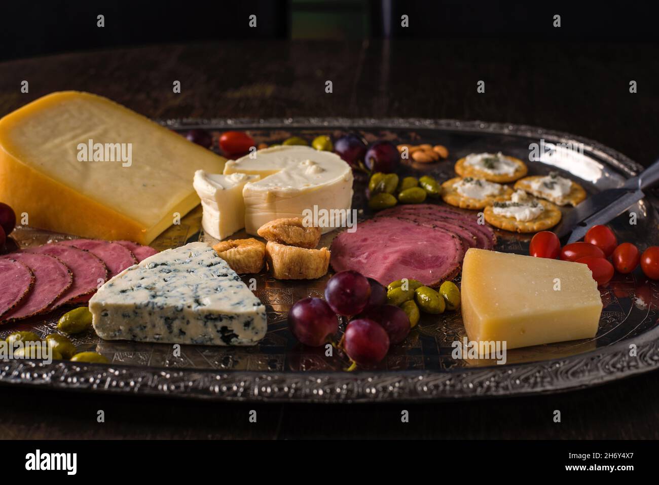 Cheese platter on a silver tray Stock Photo - Alamy