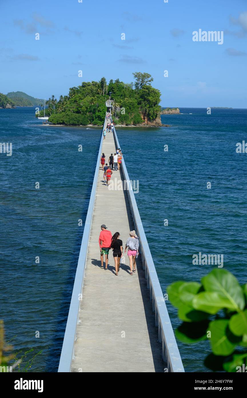HD photo shows a bridge between islands in the Caribbean. Samana city ...