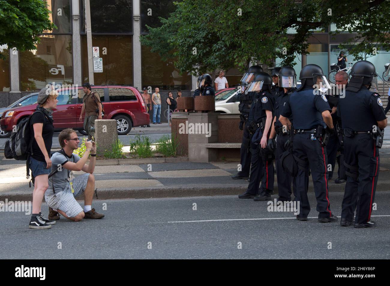 Toronto, Ontario, Canada - 25th June 2010: Rioter confronting the riot ...