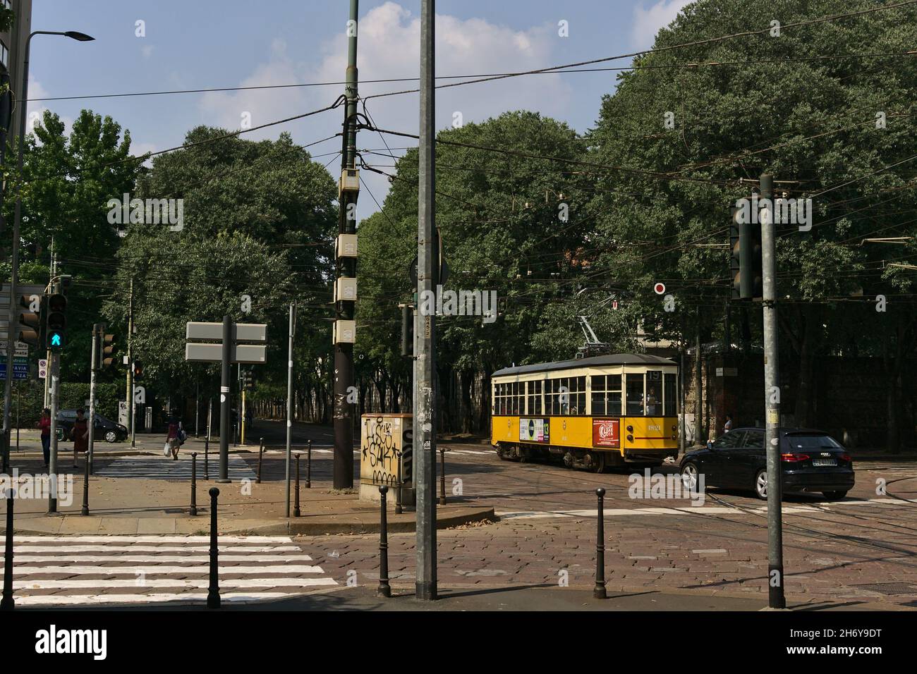 MILAN, ITALY - Sep 03, 2019: A yellow tram of Milan transportation ...