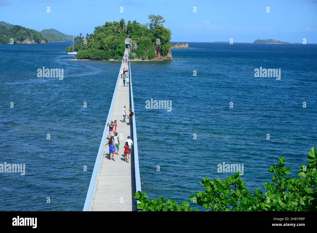 HD photo shows a bridge between islands in the Caribbean. Samana city ...