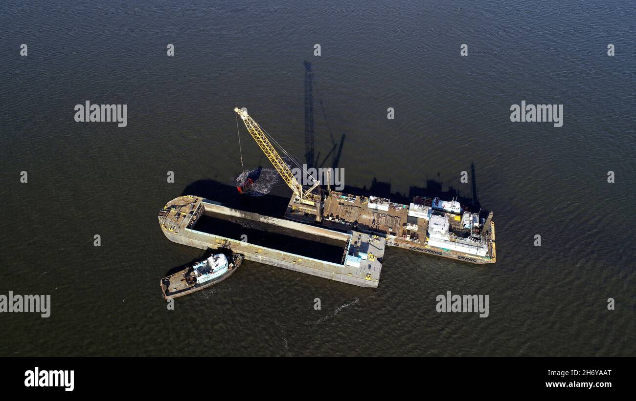 Aerial view of crane dredging mud in Raritan Bay, New Jersey Stock ...