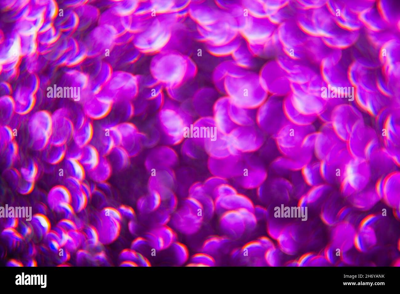 Texture created from oval purple objects. The effect was obtained by ...