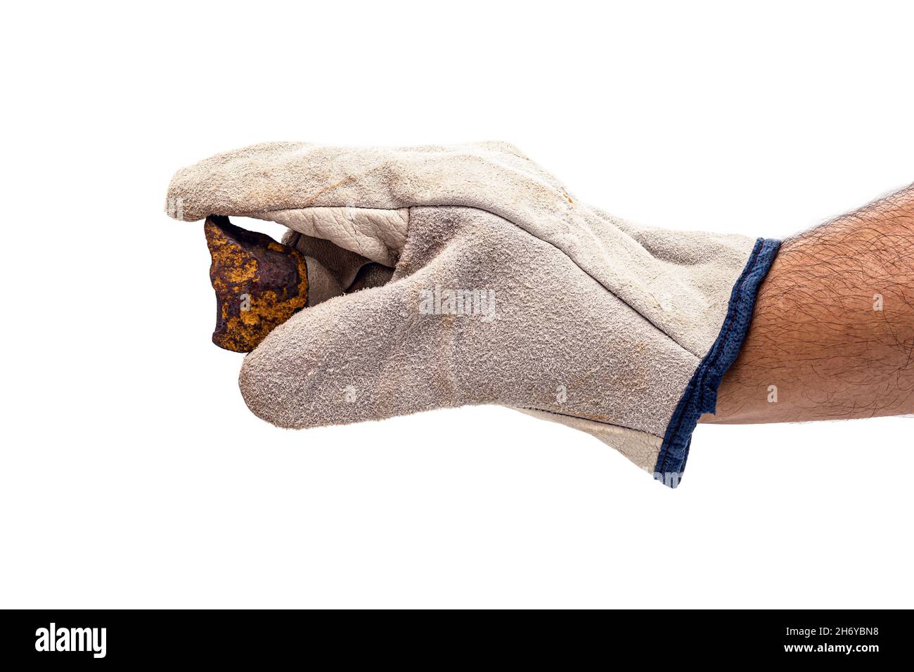 male miner hand holding metallic rock, mining or geology concept ...