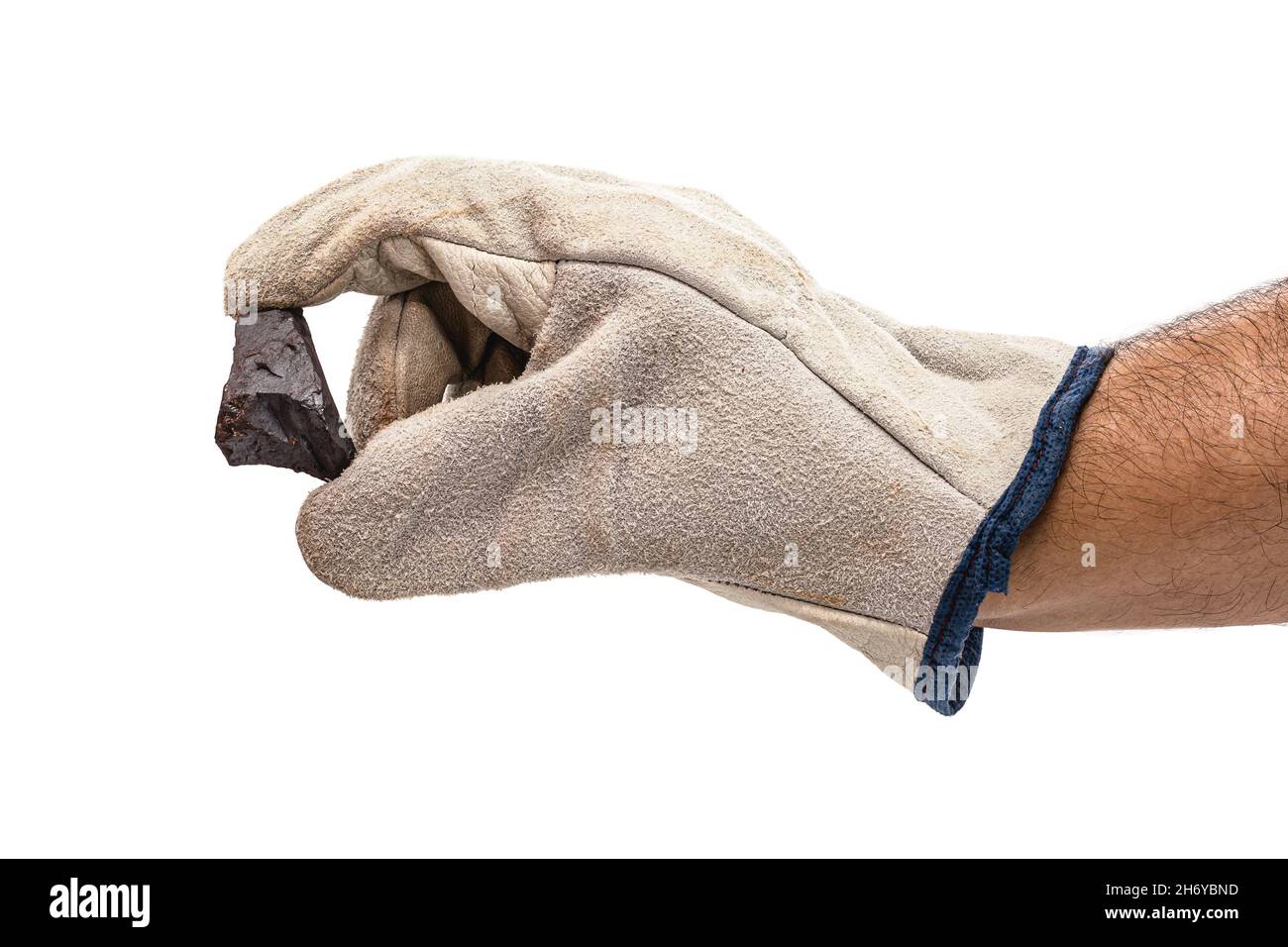 male miner hand holding iron ore, rough rock, mining or geology concept ...