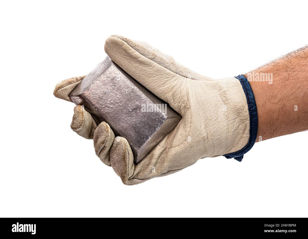 miner hand with protective glove holding silver bar, metallic stone ...