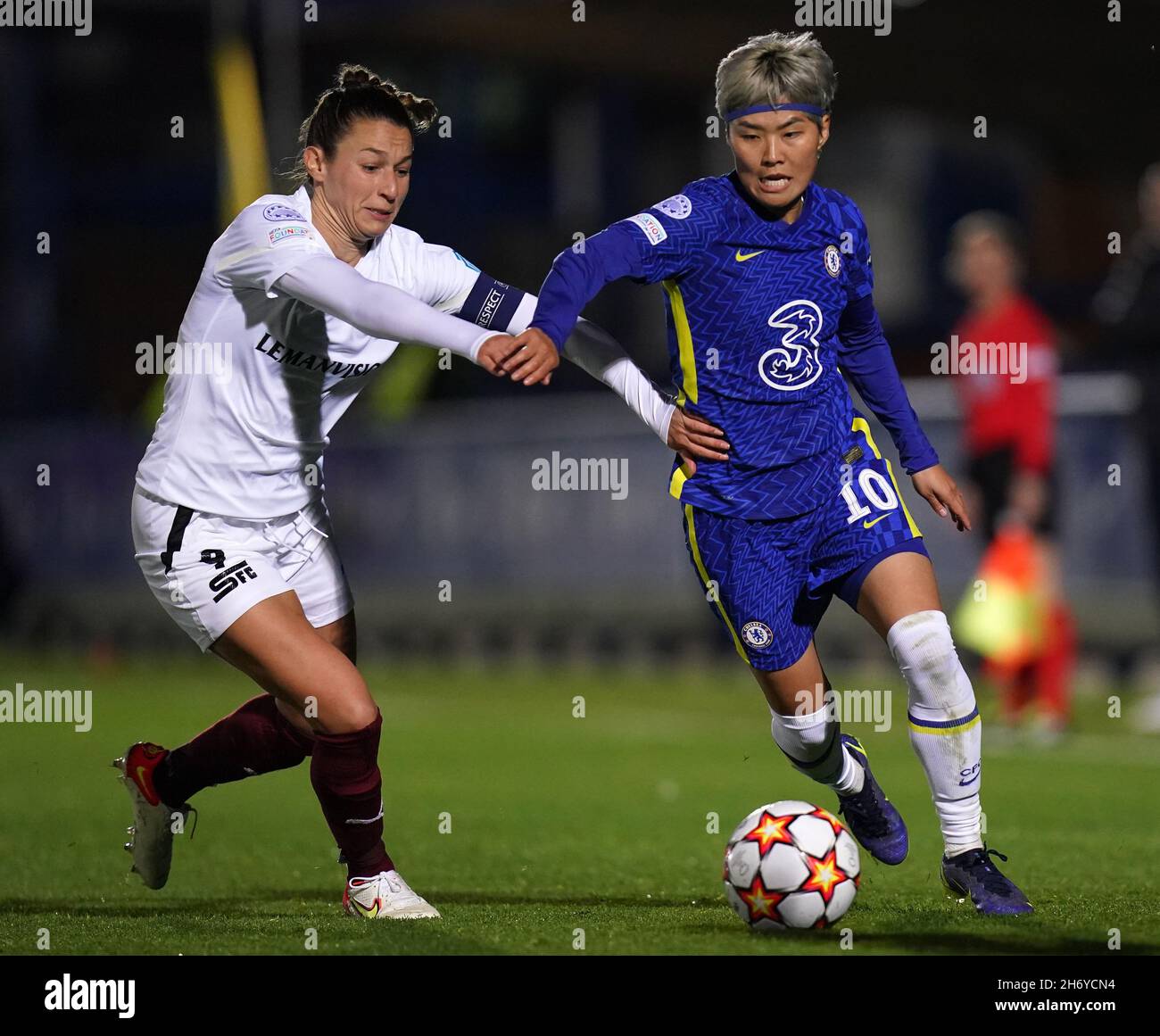 Servette's Alyssa Lagonia (left) pulls back on Chelsea's Ji So-Yun ...