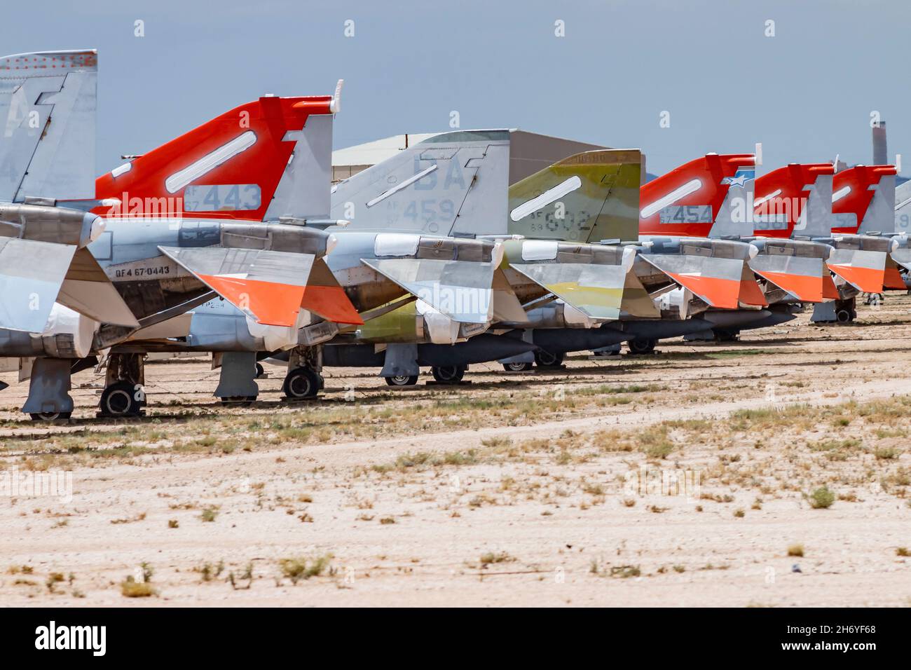 row of decommissioned fighter aircraft at Davis-Monthan Air Force ...