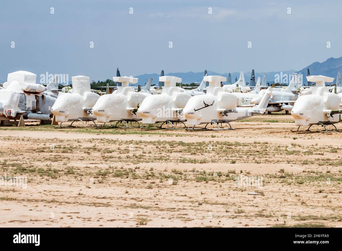 rows of decommissioned and wrapped helicopters at Davis-Monthan Air ...