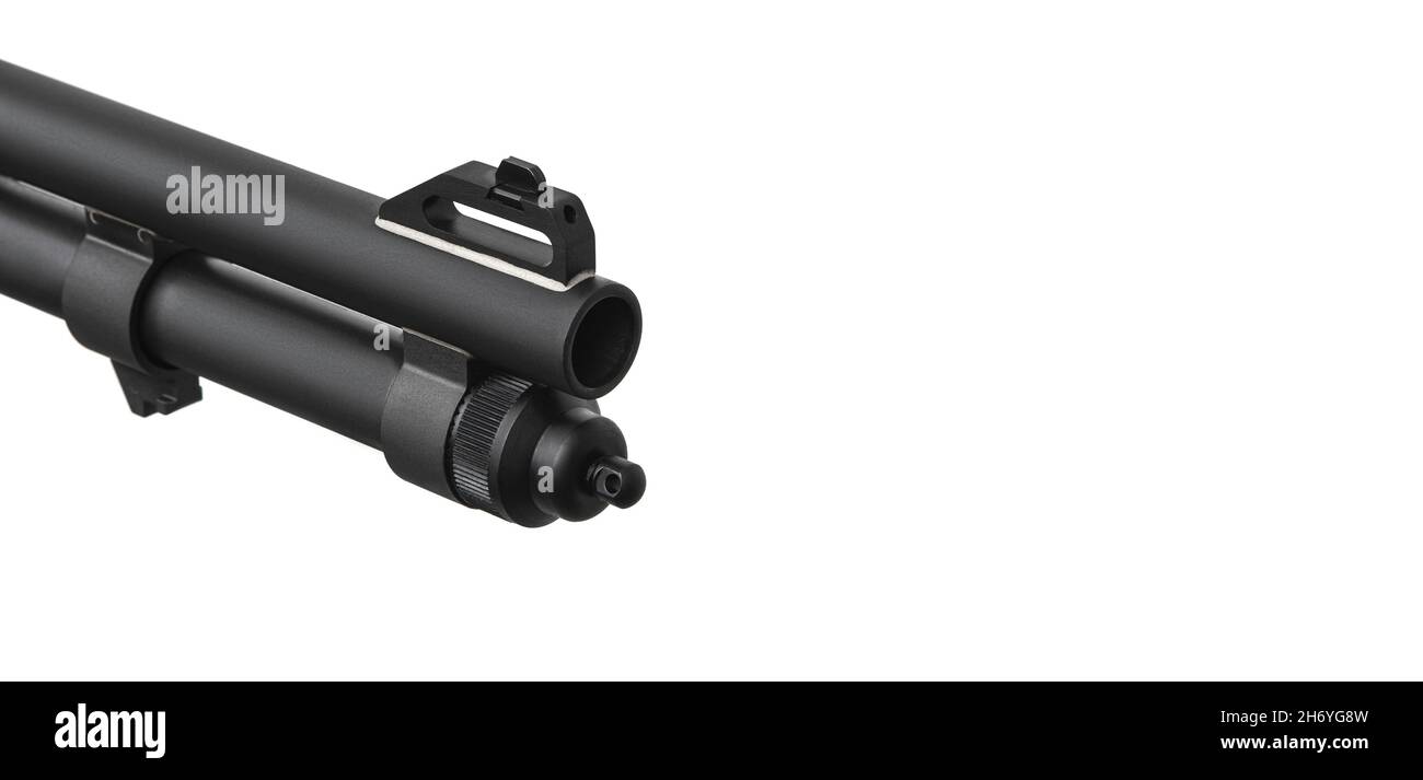 Pump-action 12 gauge shotgun isolated on a white background. Close-up ...