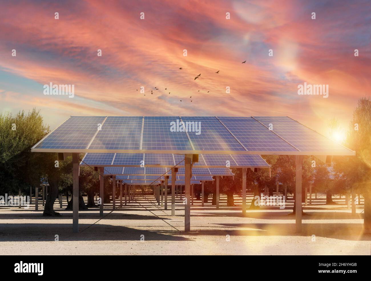 Renewable energy system with a group of solar panel Stock Photo - Alamy