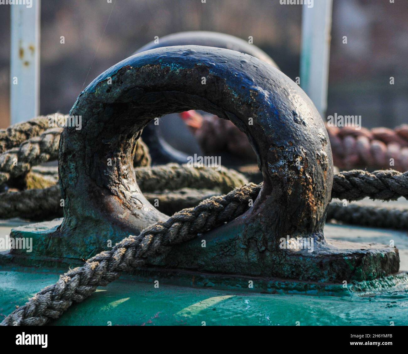 Closeup shot of mooring shackles on the quay Stock Photo - Alamy