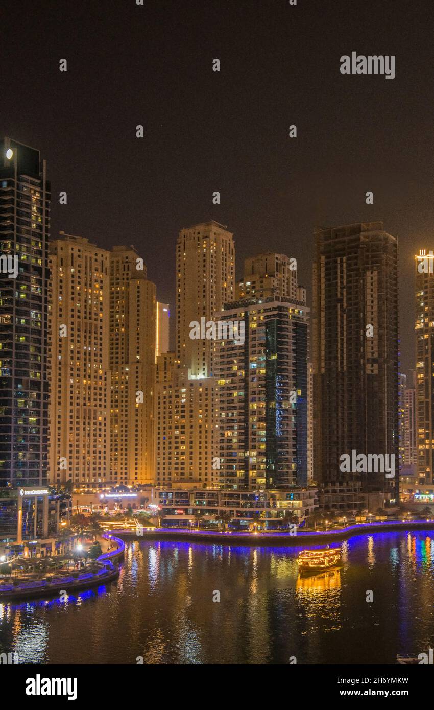 Marina at night with lit boat Dubai UAE Stock Photo - Alamy
