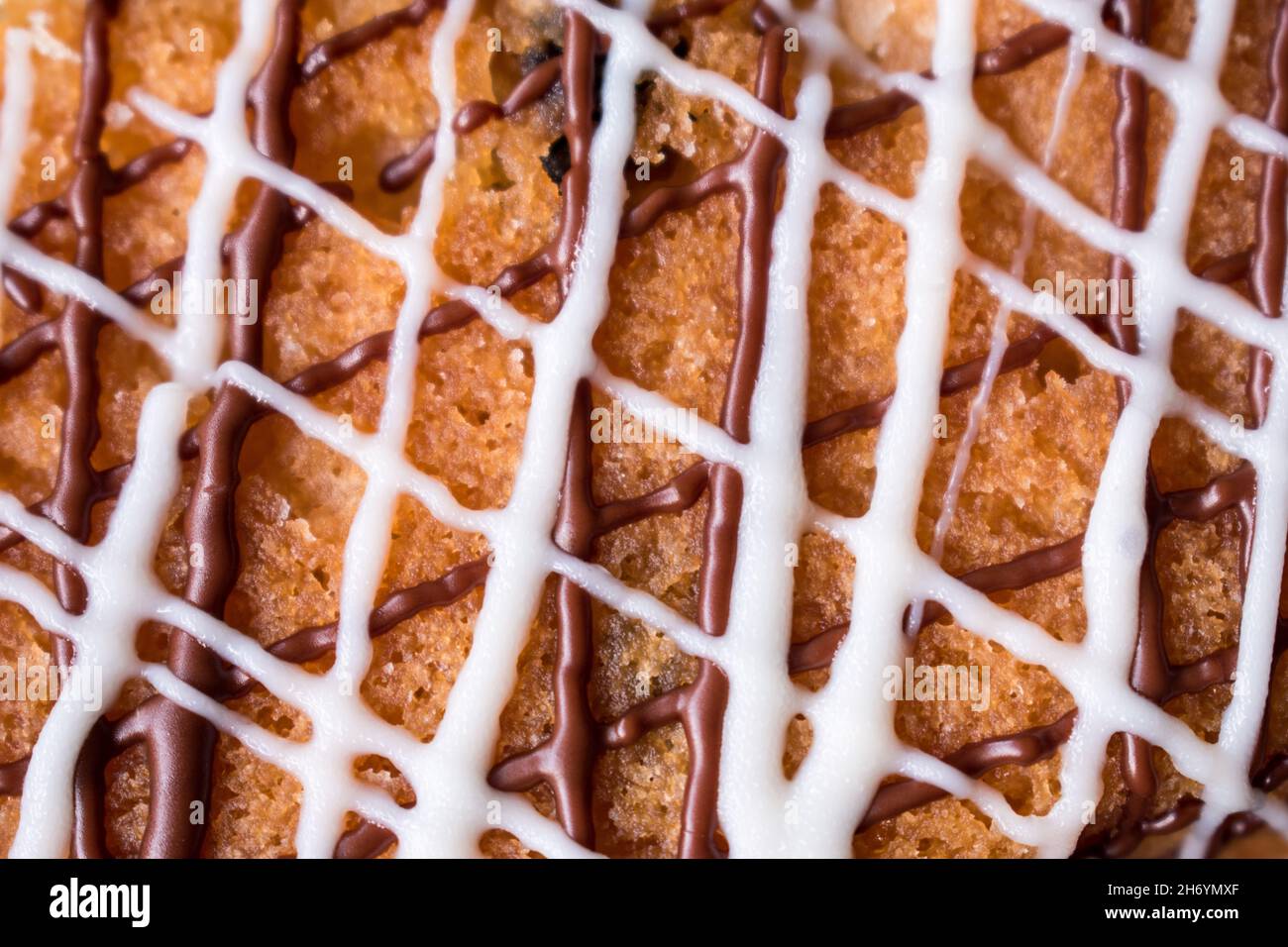 Close up of a chocolate cake texture with white and brown lines of ...