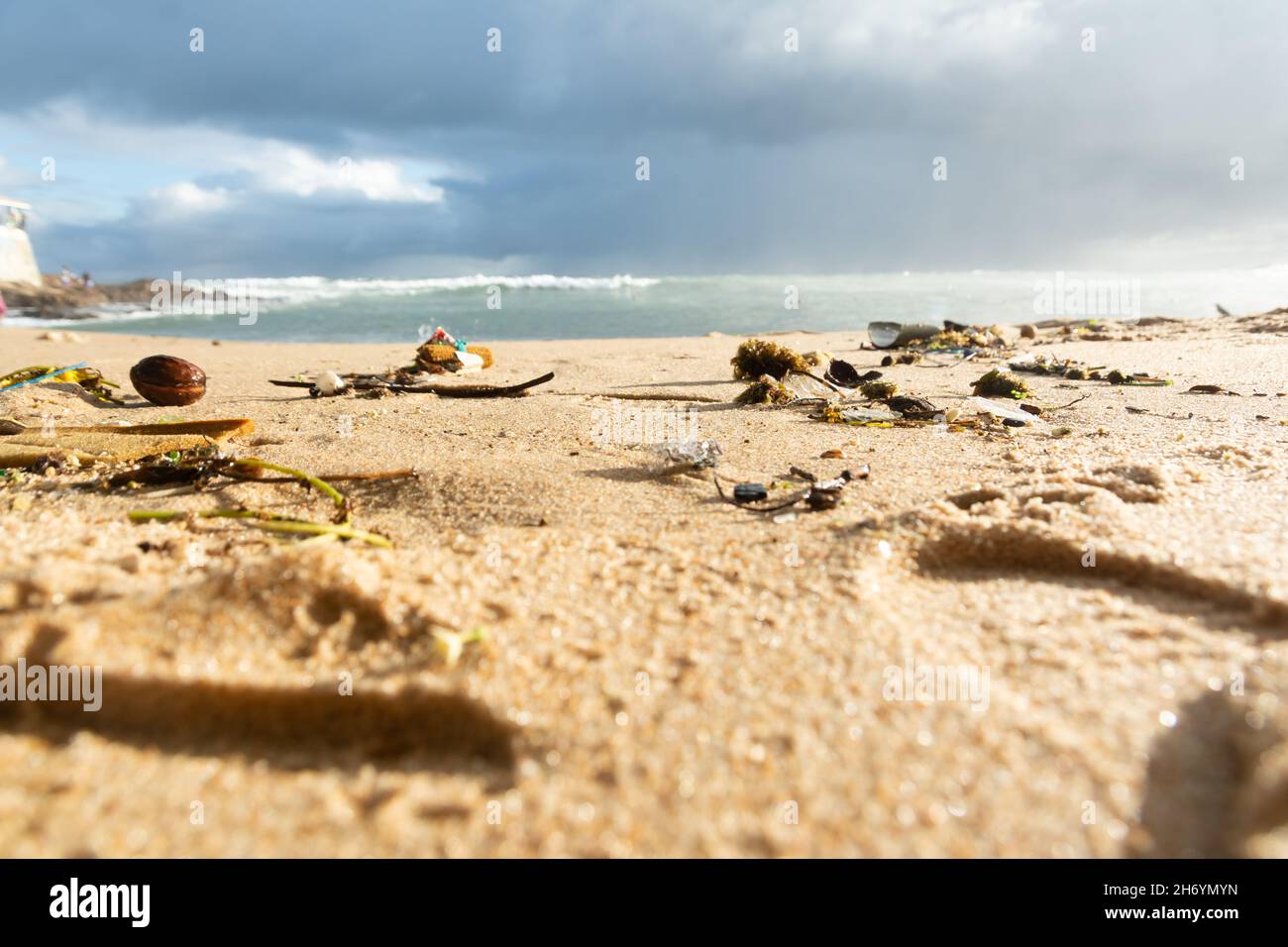 Sea waves from Praia do Rio Vermelho breaking on the clear sands ...