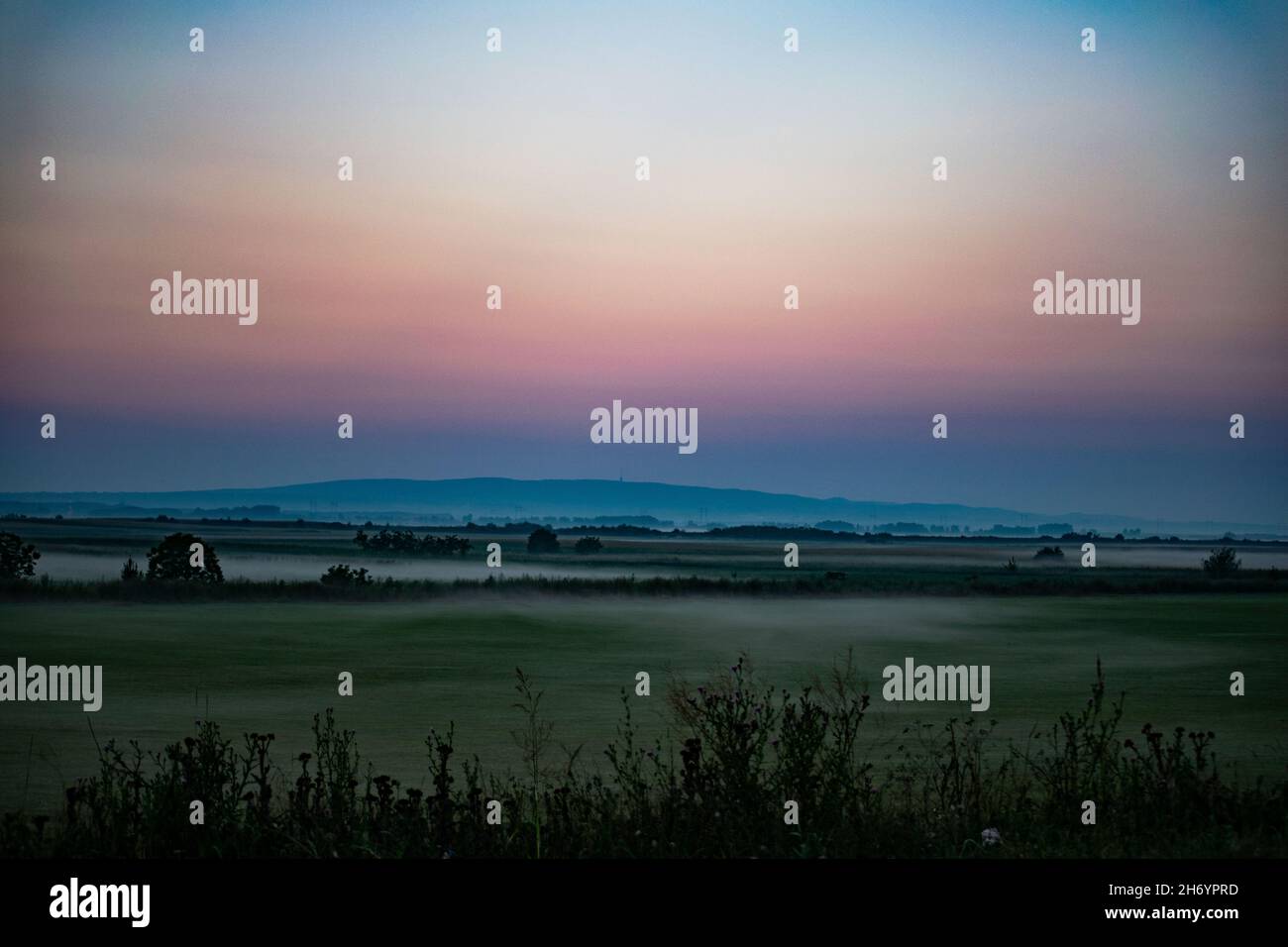 Sunset sky over the rural area Stock Photo - Alamy