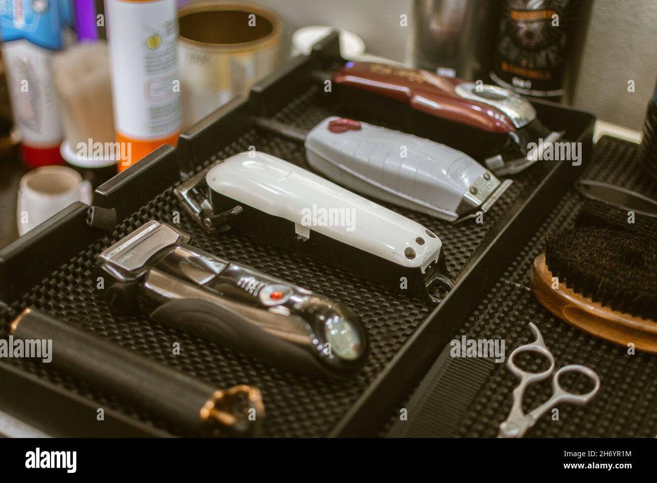 Set of shaving machines on a table in a barber shop Stock Photo - Alamy