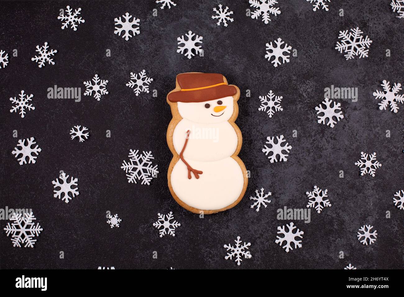 Close up Holiday Gingerbread snowman decorated with white icing and ...