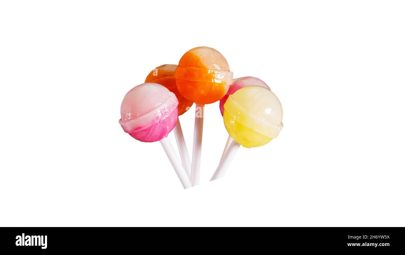 Mix of lollipops of different colors, candies on a stick isolated on a ...