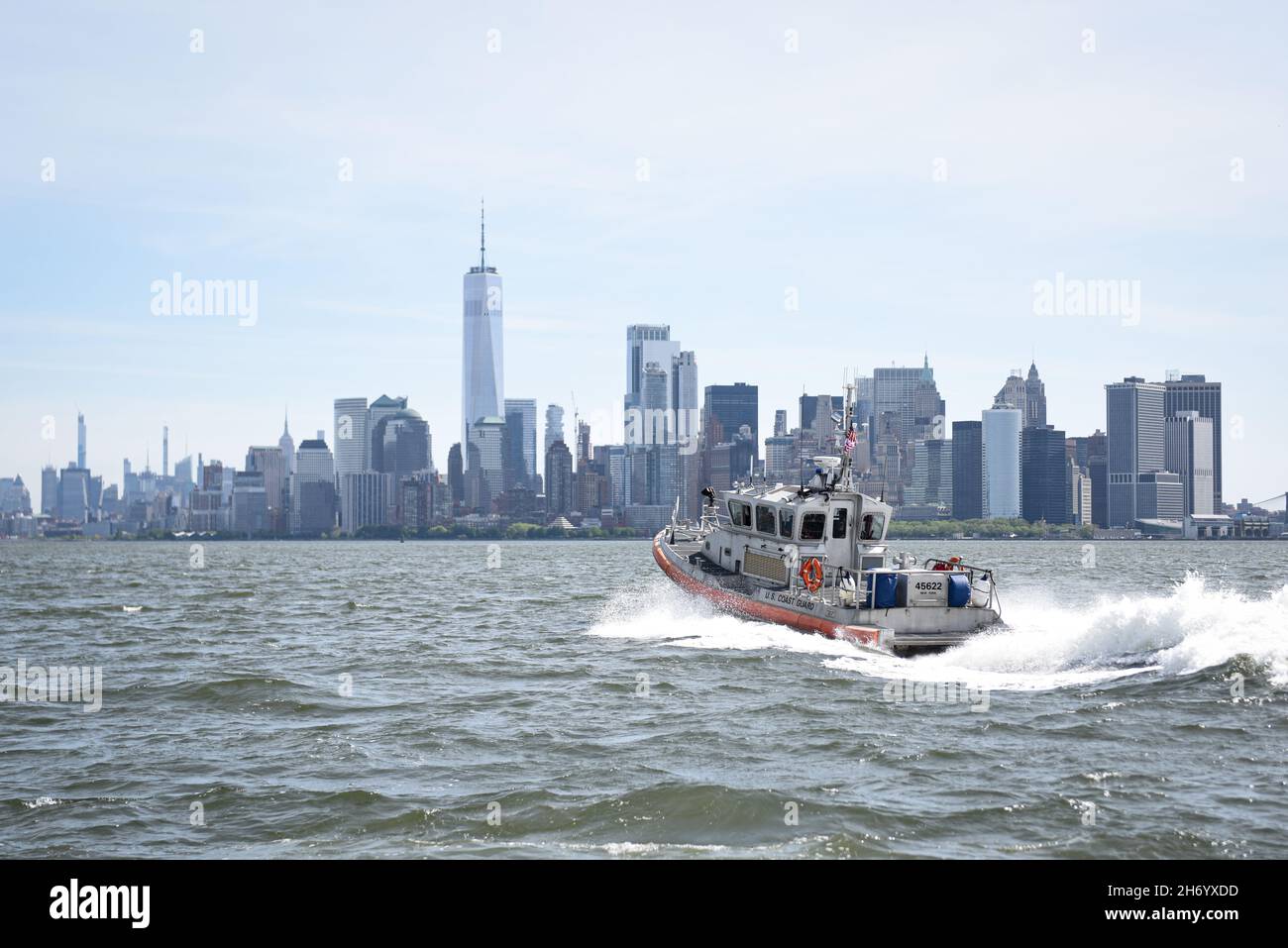A Coast Guard Station New York small boat transits through New York ...
