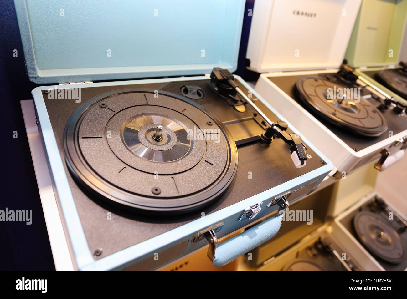 Turntable with vinyl record on wooden background, top view. High ...