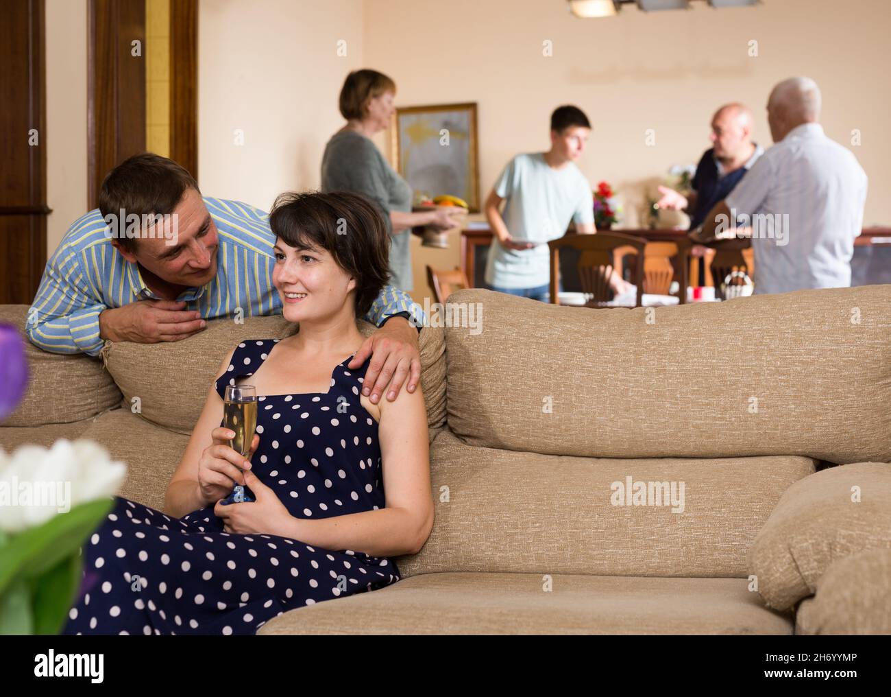 Happy family together in living room Stock Photo - Alamy