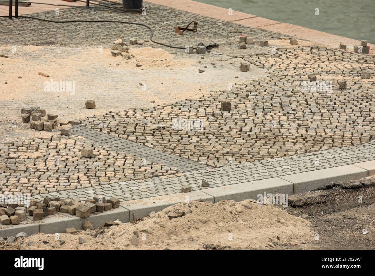 Picture of a cobblestone sidewalk on the construction site Stock Photo ...