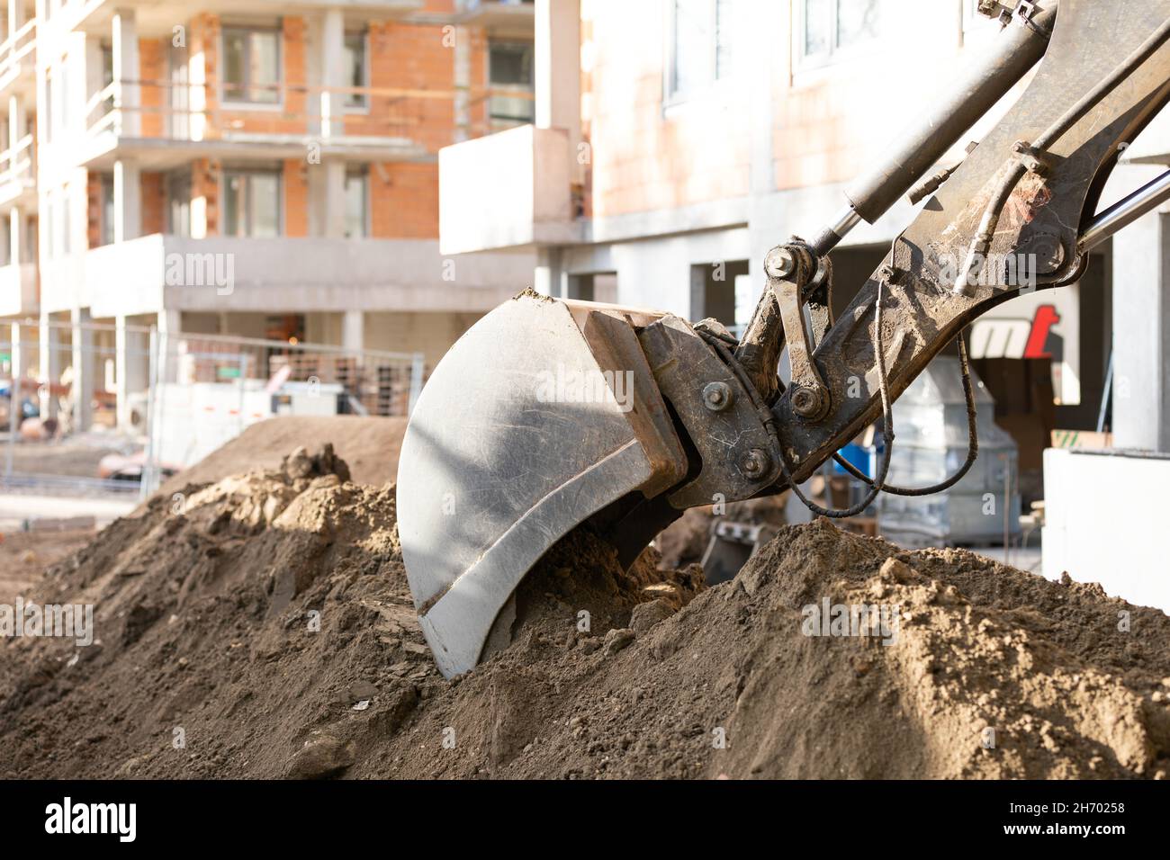 Picture of an excavators machine in construction site Stock Photo - Alamy