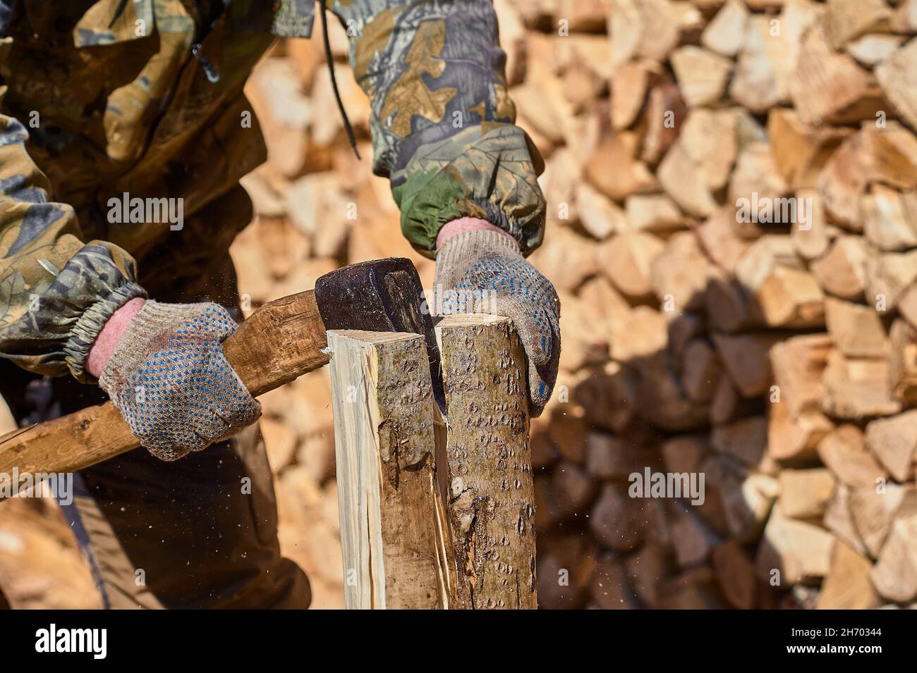 chopping firewood with an axe close-up Stock Photo - Alamy