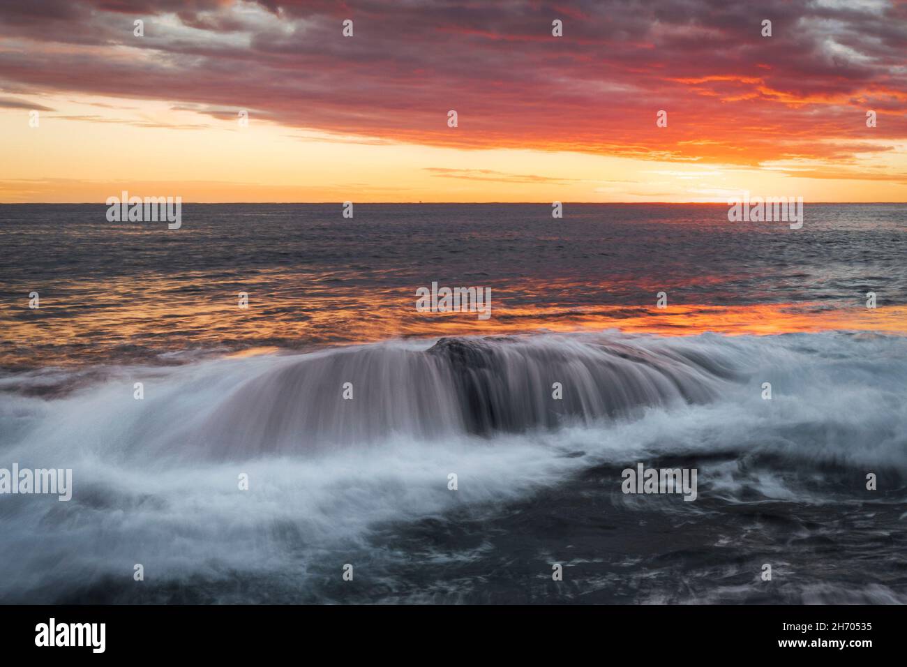 Waterfall cascades over rocky cliff hi-res stock photography and images ...