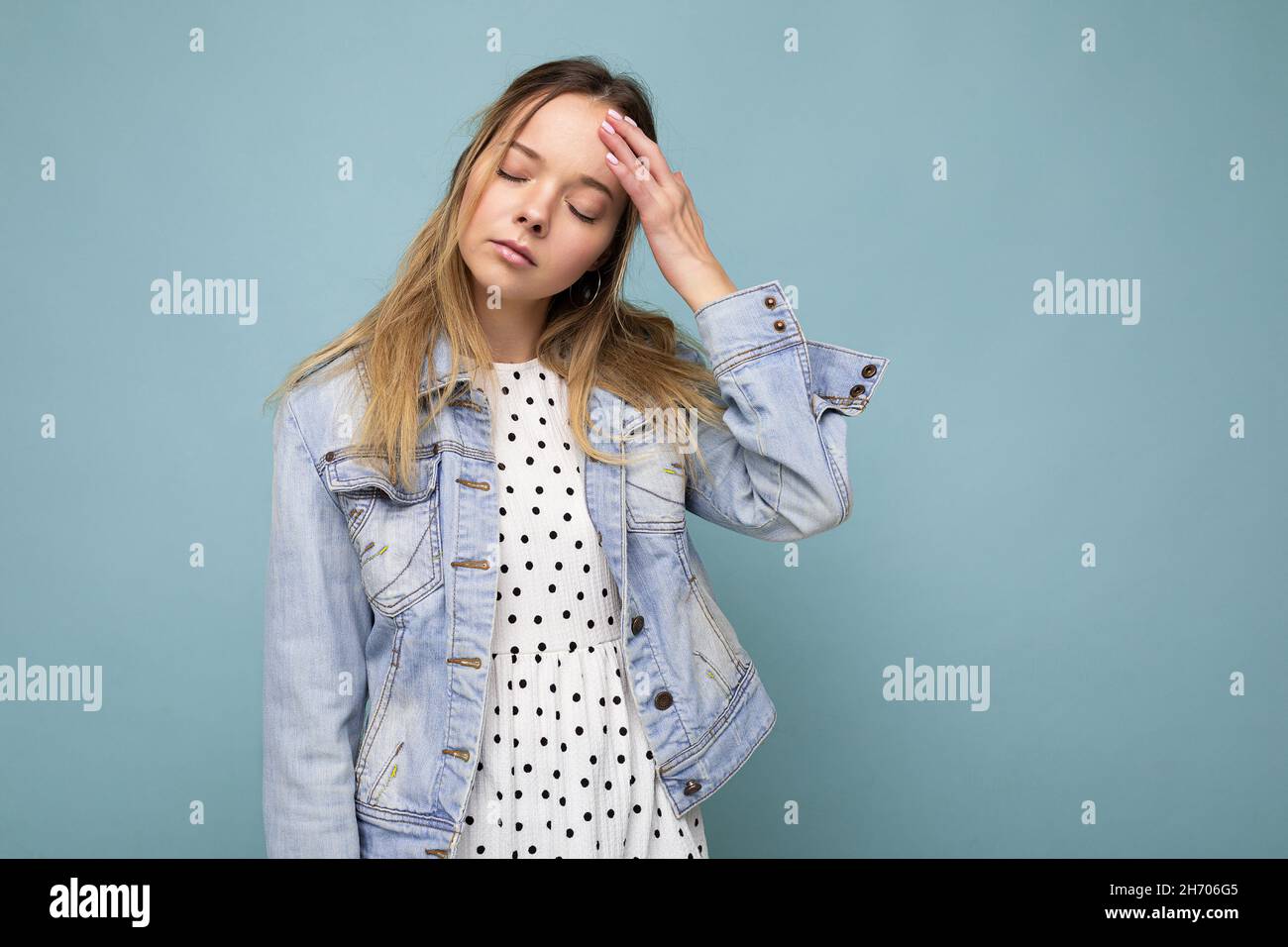 Photo of young tired weary attractive blonde lady with sincere emotions ...