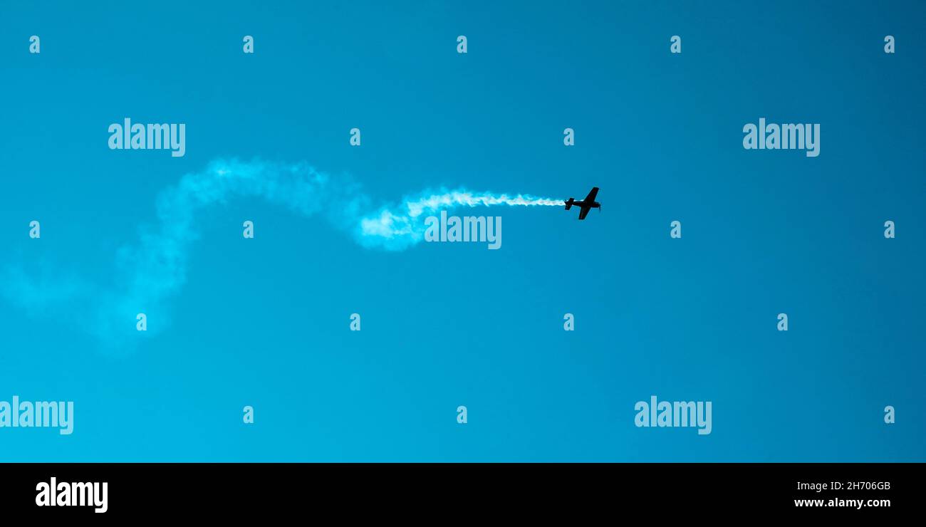 Overhead flying aircraft. Aircraft in formation during an aerobatics ...