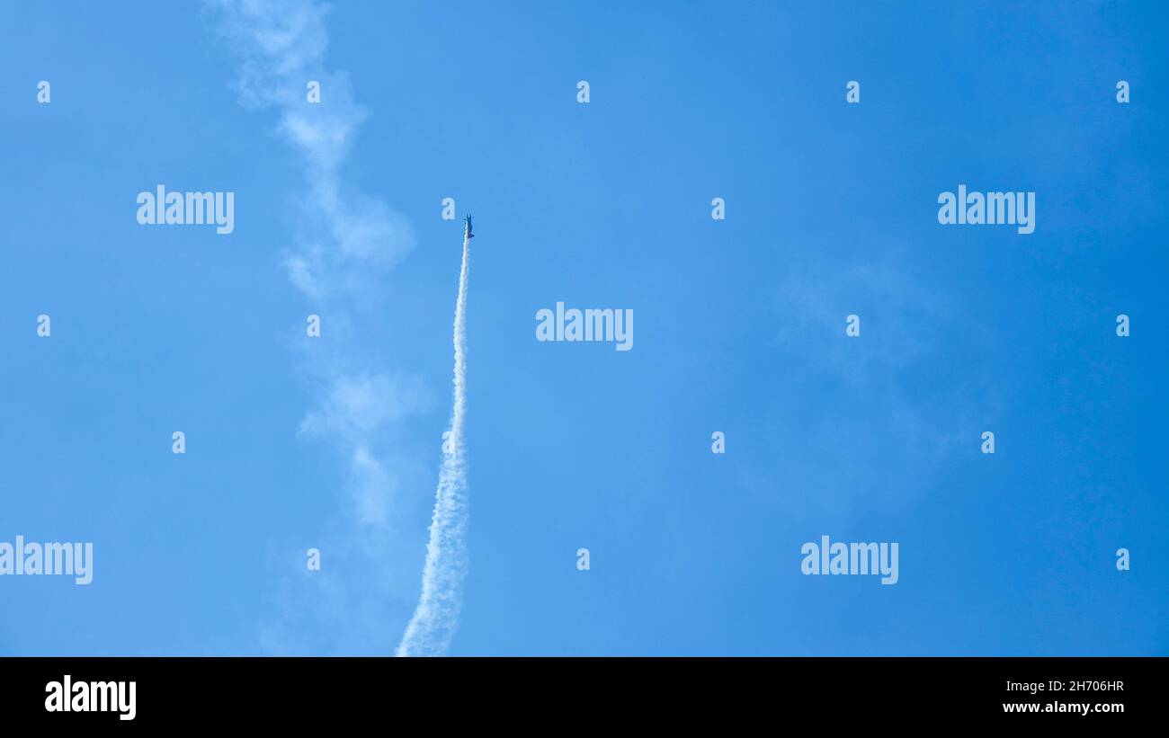 Overhead flying aircraft. Aircraft in formation during an aerobatics ...