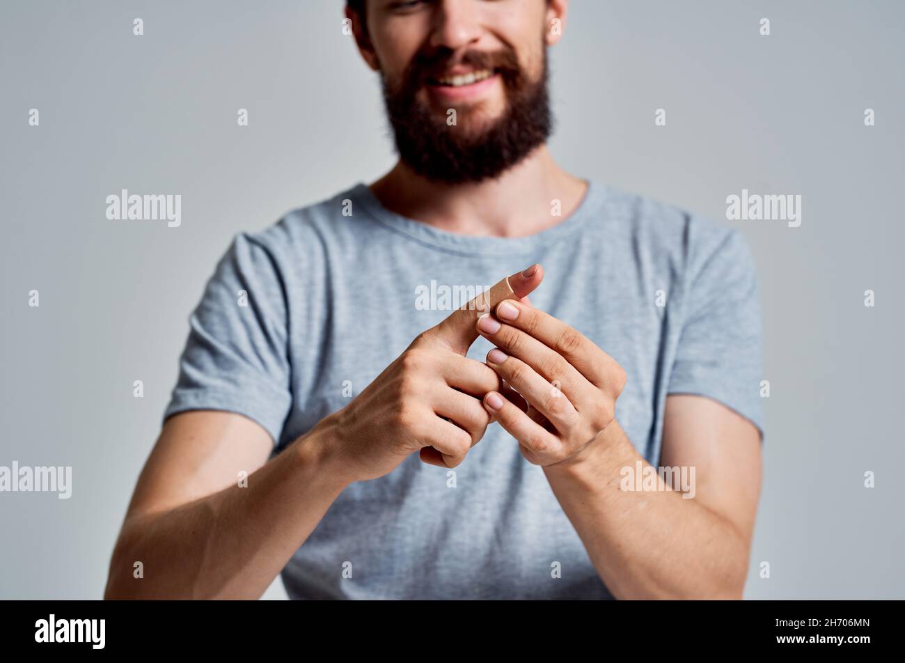 man with bandaged finger help treatment Stock Photo - Alamy