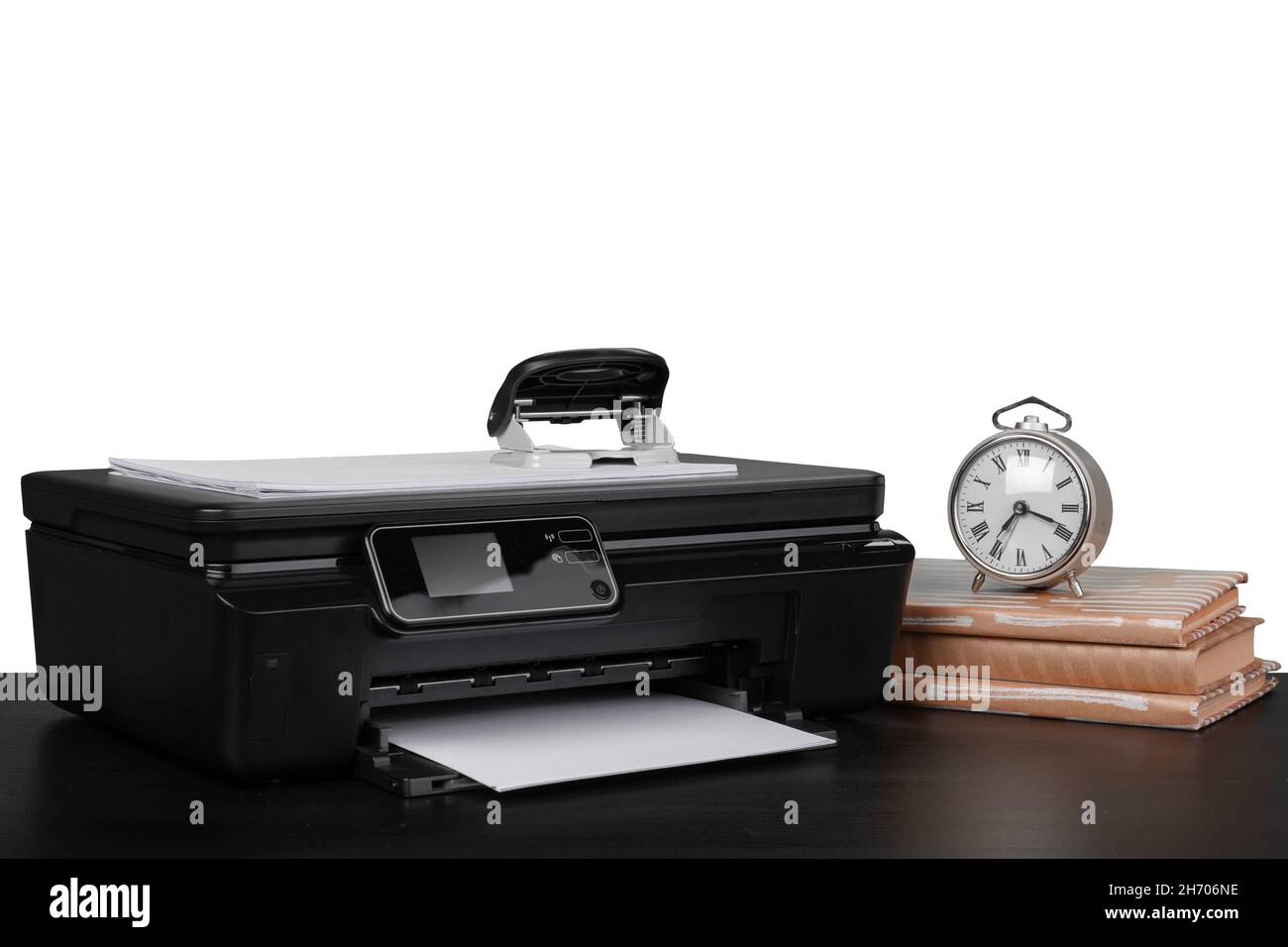 Office table with laser printer and books against white background ...