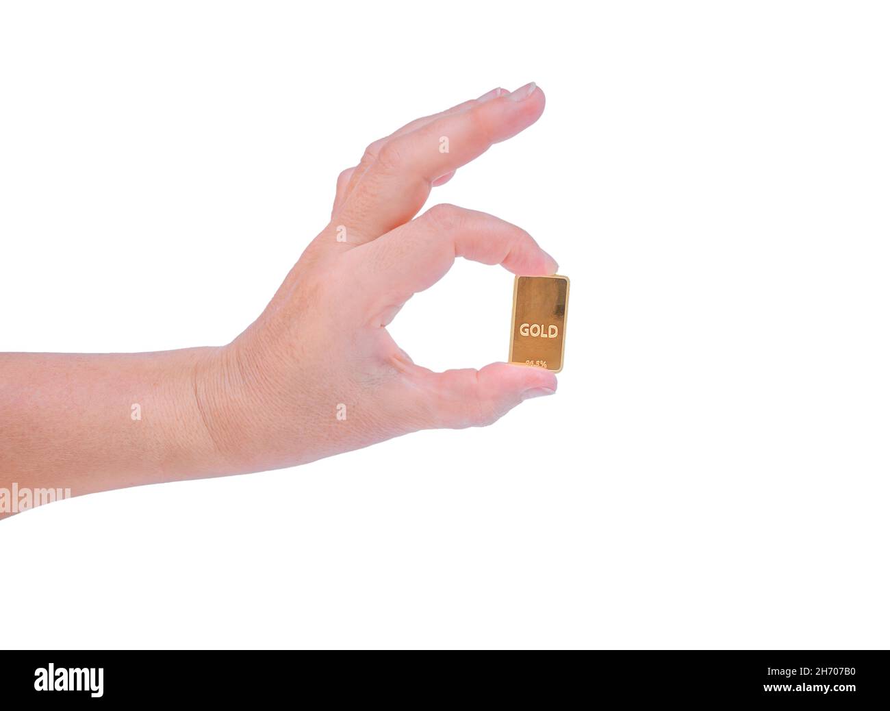 Female hand holding a gold ingot isolated on white background Stock ...