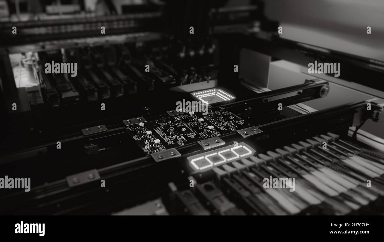 Automatic production of computer chips by SMT Pick and Place machine ...