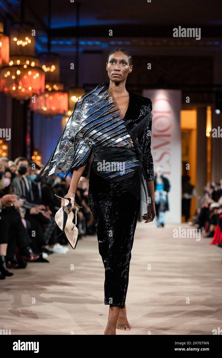 Paris, France. 18th Nov, 2021. Models display outfits designed by the ...