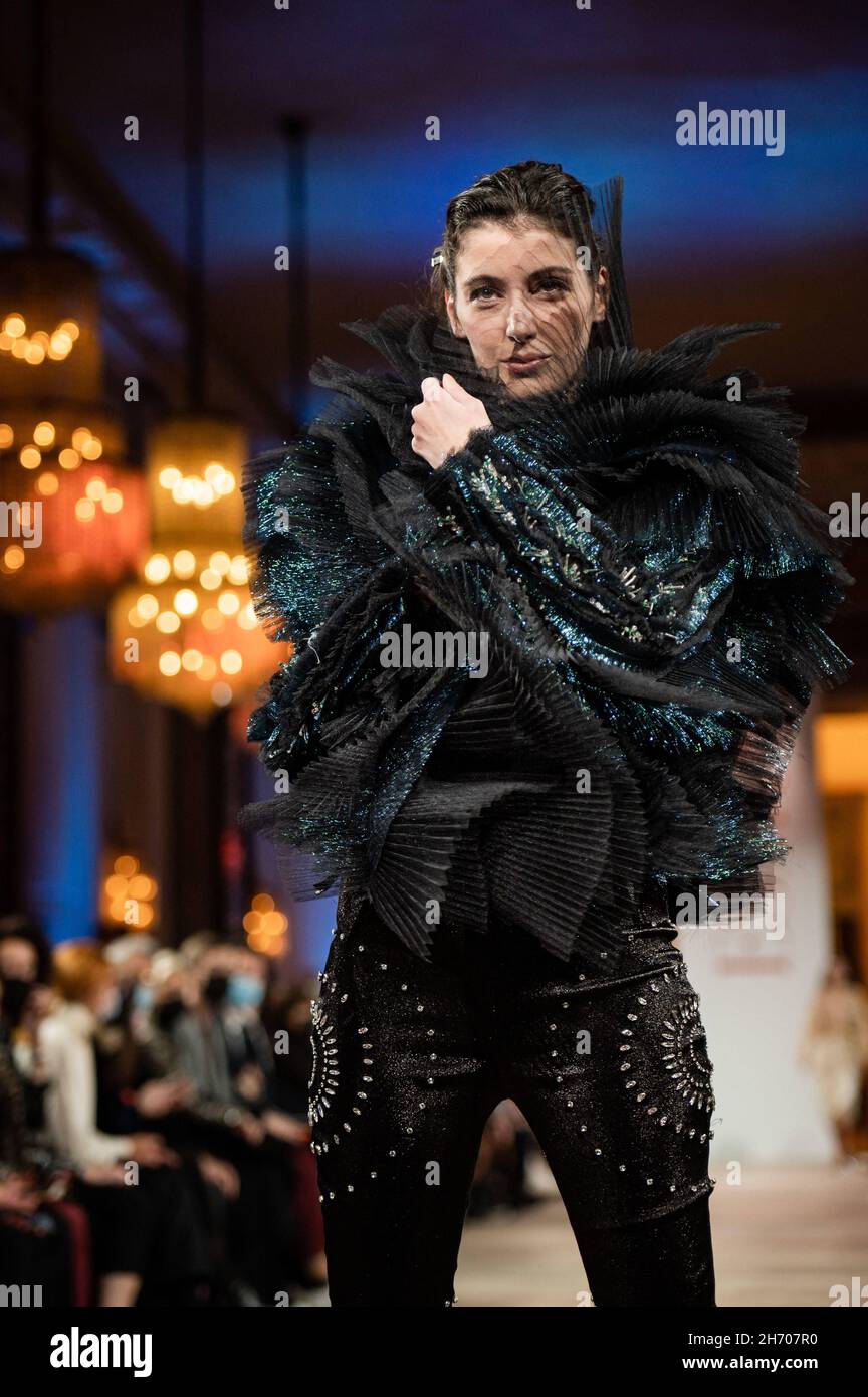 Paris, France. 18th Nov, 2021. Models display outfits designed by the ...