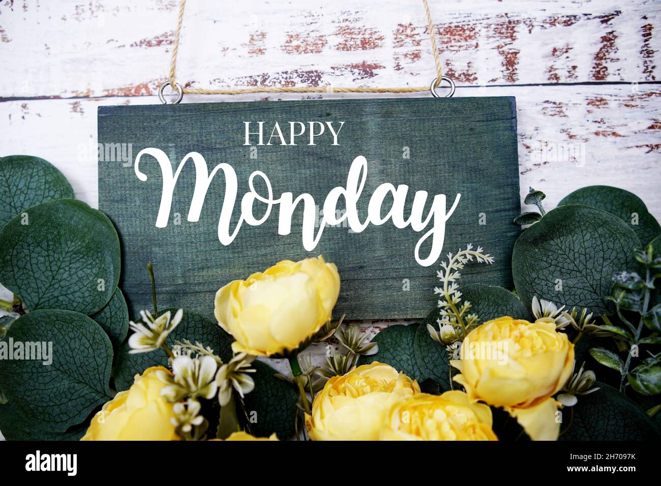 Happy Monday typography text with flower decoration on wooden ...