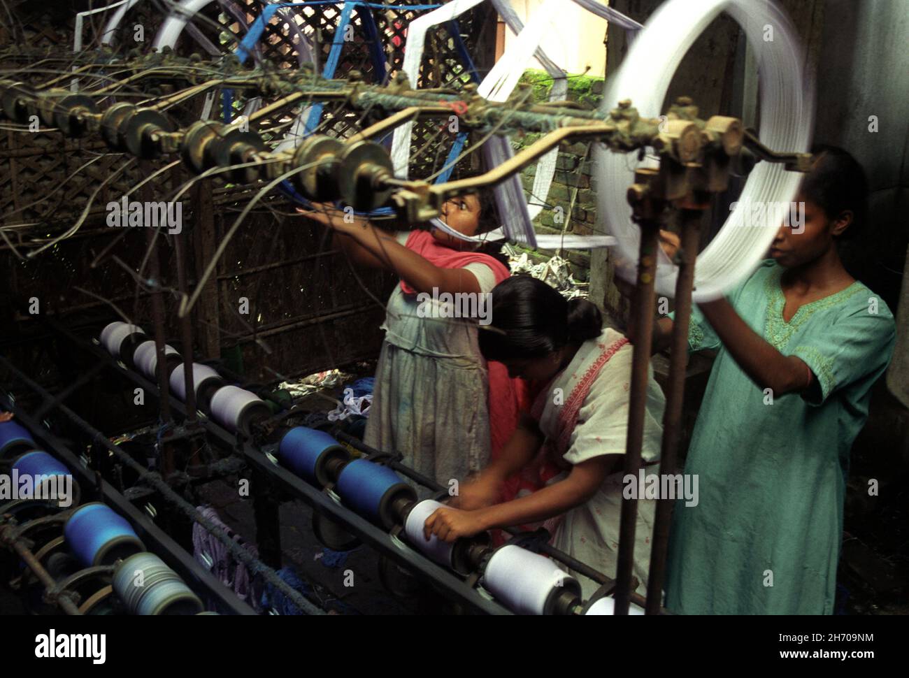People working in a weaving factory. India Stock Photo - Alamy