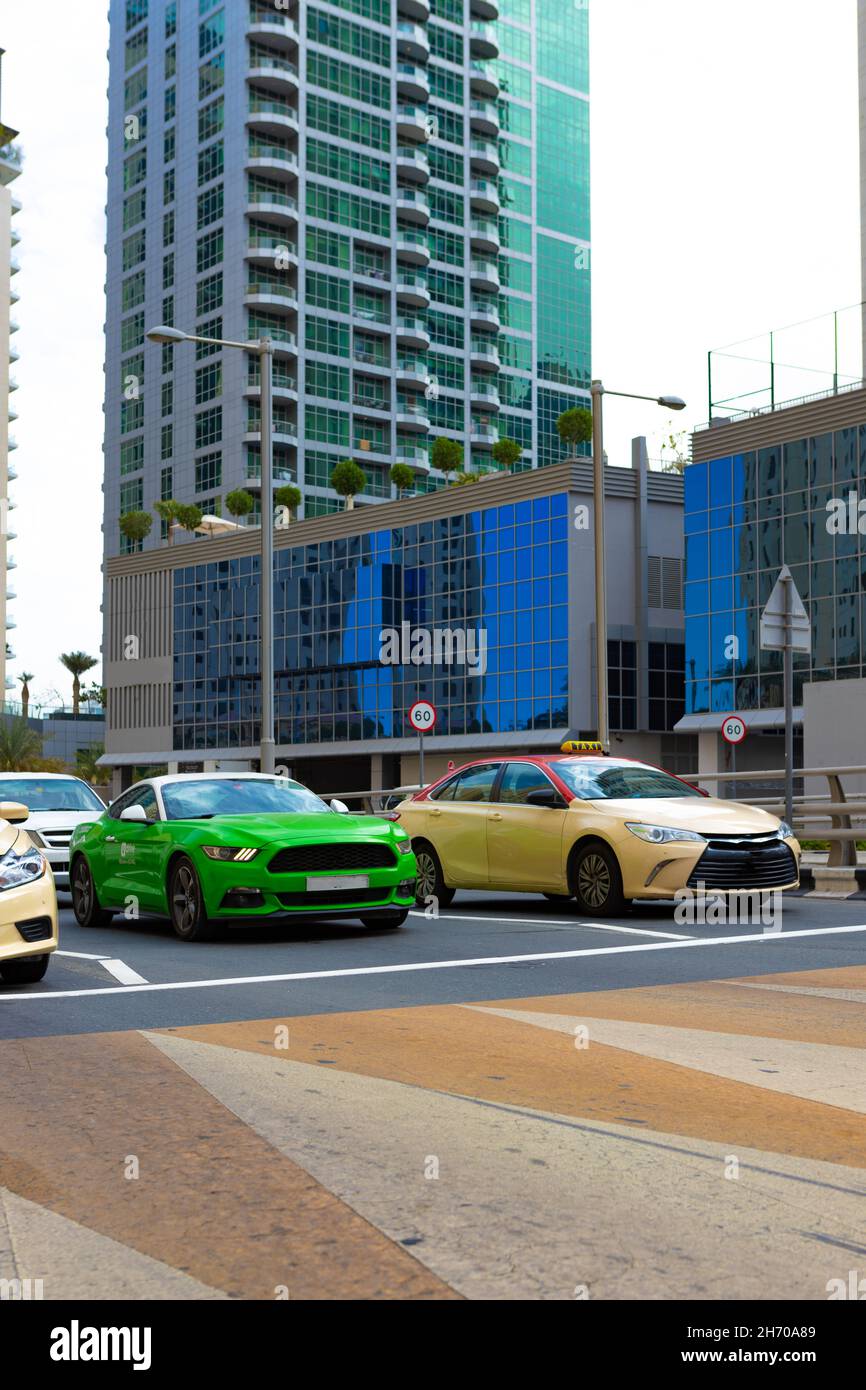 Asphalt road with modern city skyline of Dubai Stock Photo - Alamy
