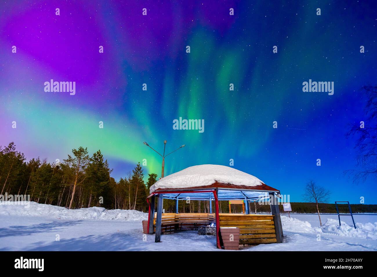 Colorful arctic polar night starry sky background of aurora borealis ...