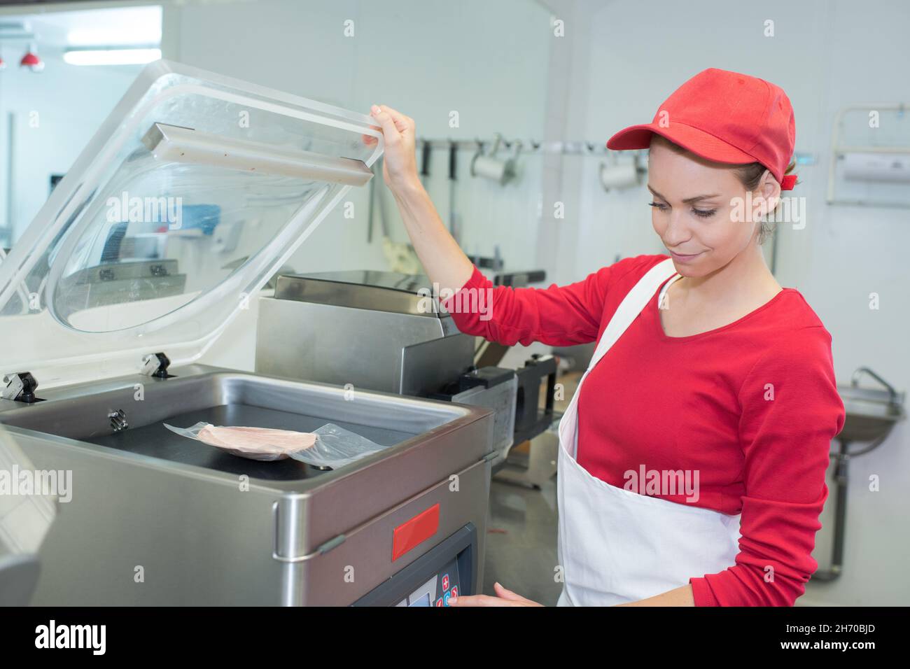 Woman meat grinder hi-res stock photography and images - Alamy