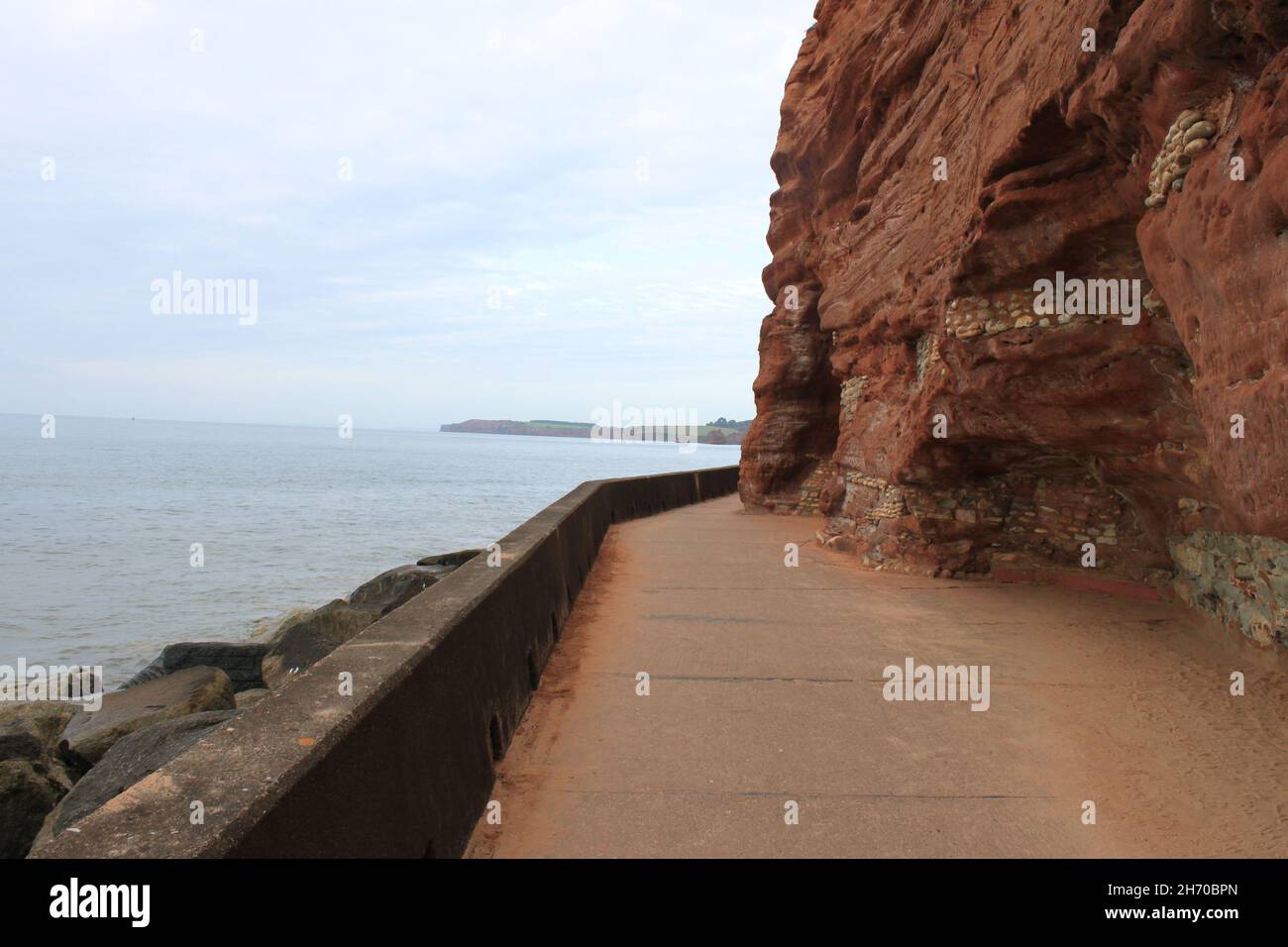Red sand stone cliffs.The England south west coast path. Sidmouth ...
