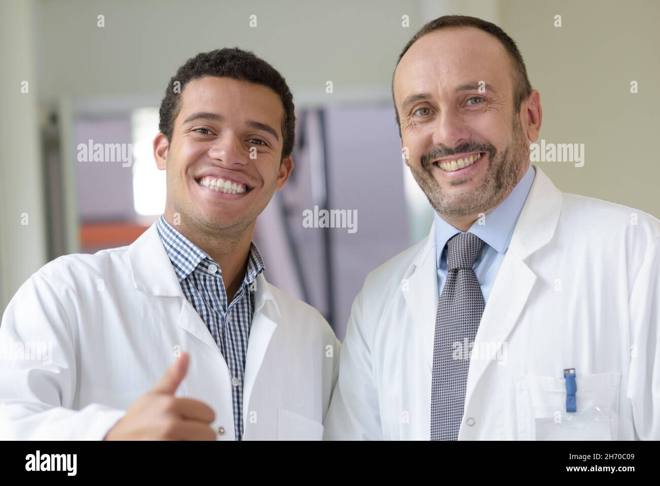 portrait of two happy doctors Stock Photo - Alamy